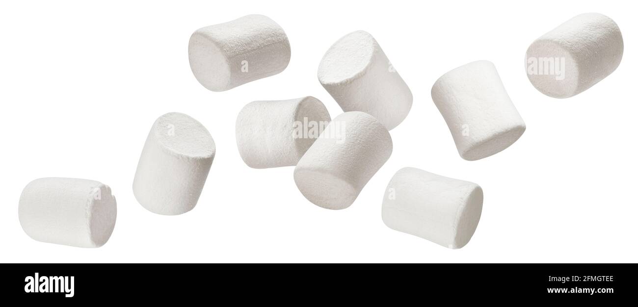 Falling marshmallows isolated on white background Stock Photo - Alamy