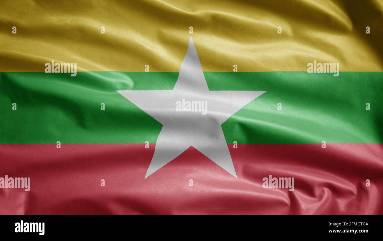 Myanmar flag waving in the wind. Close up of Burma banner blowing, soft ...