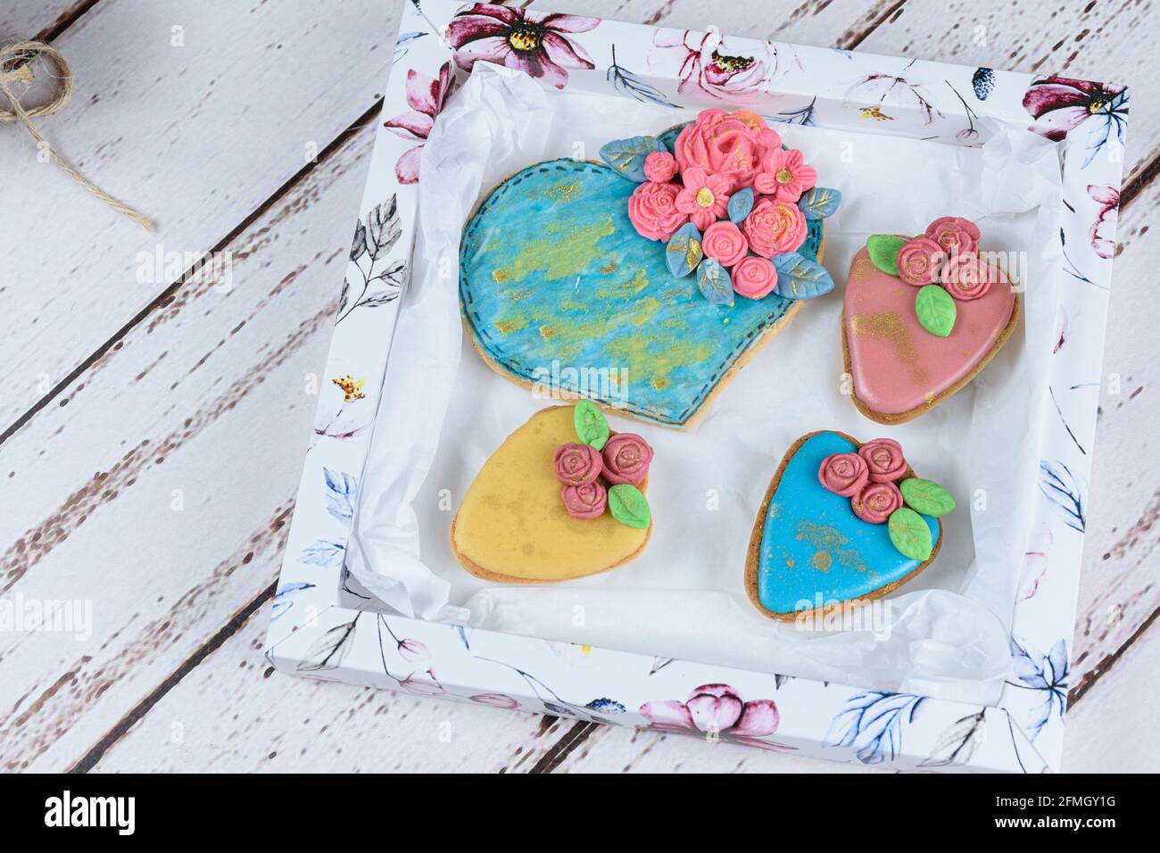 Buttery cookies, decorated with rolling fondant and royal icing Stock ...
