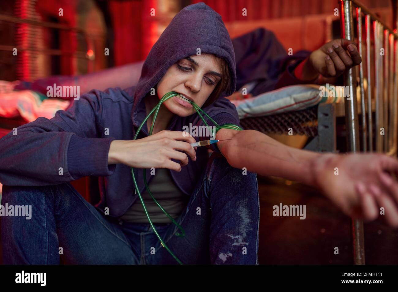 Female drug addict syringe in hi-res stock photography and images - Alamy