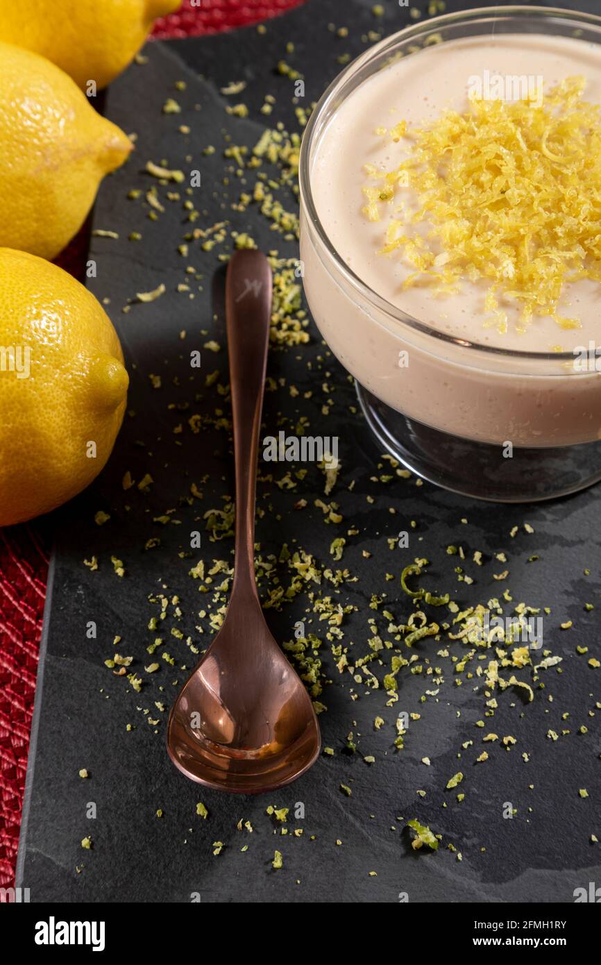 Lemon mousse in crystal bowl with lemon zest Stock Photo - Alamy