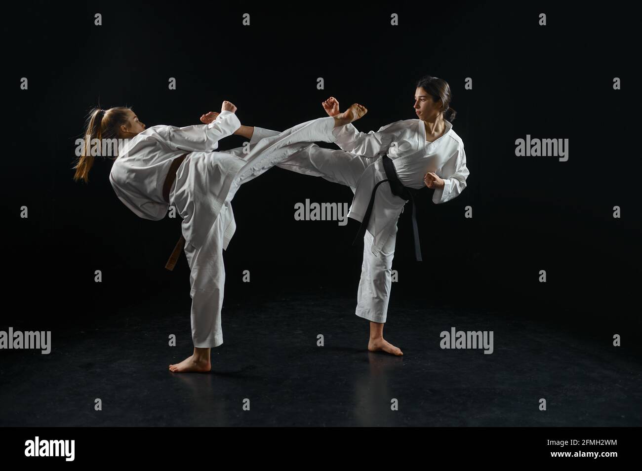 Male fighters in black hi-res stock photography and images - Alamy