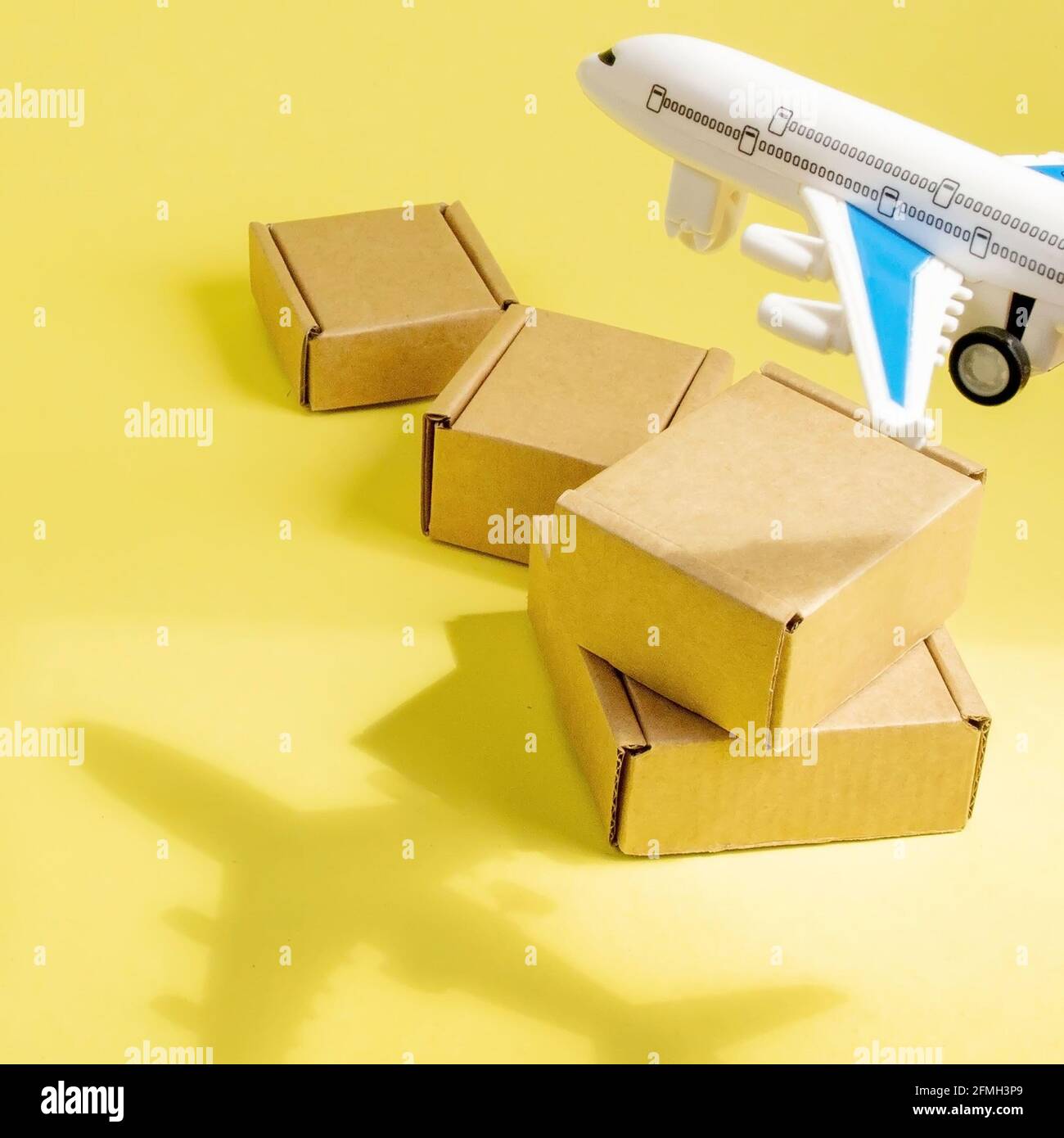Shadow Airplane and stack of cardboard boxes. concept of air cargo and ...