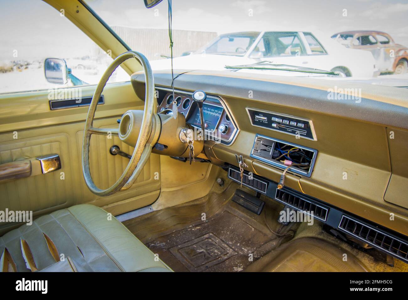 A closeup of the interior of a vintage car in the junkyard Stock Photo ...