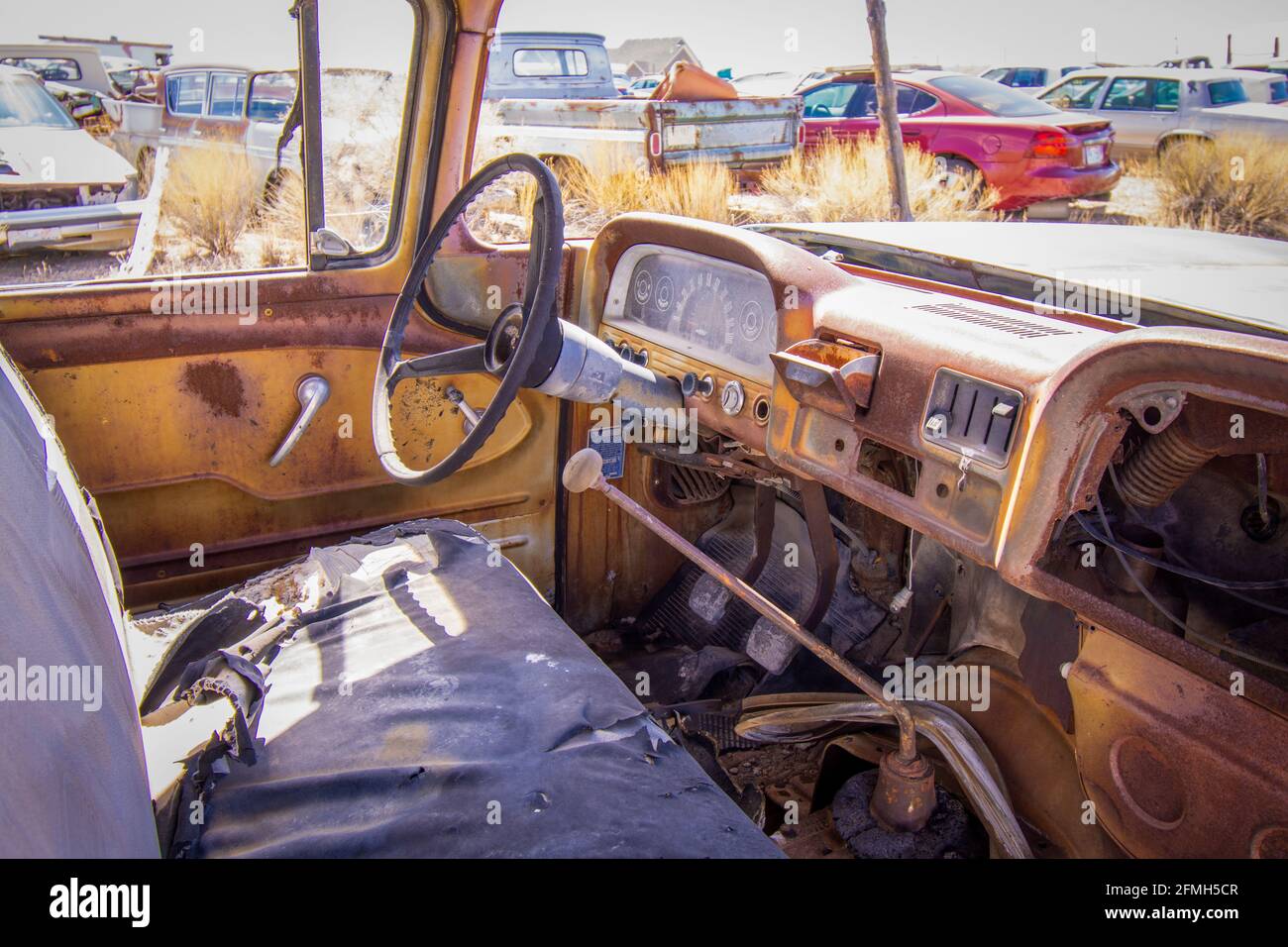 A closeup of the interior of a vintage car in the junkyard Stock Photo ...