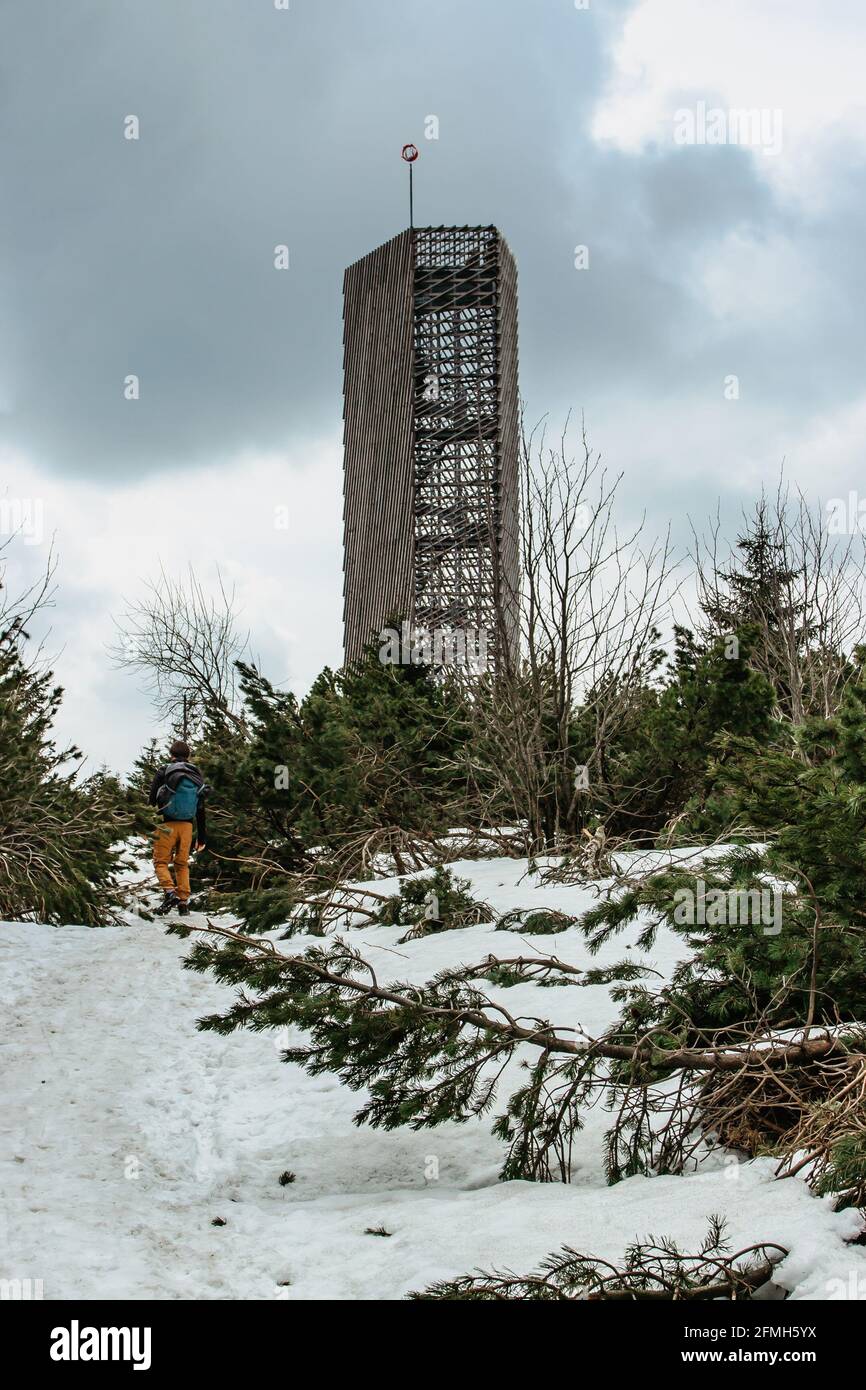 Backpacker walking to Velka Destna Lookout Tower,Orlicke,Eagle ...