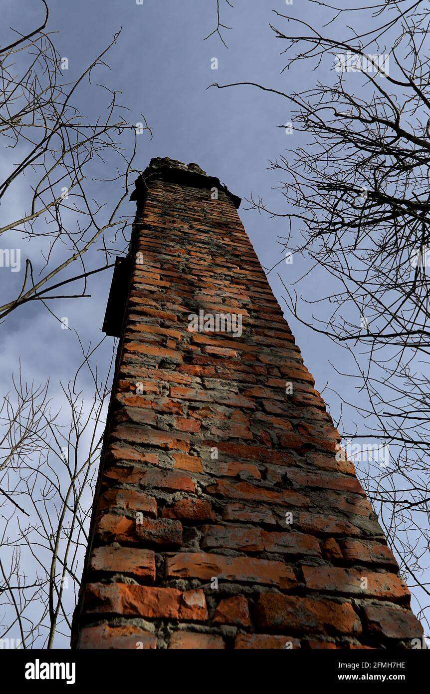 a chimney of ruined house made of bricks Stock Photo - Alamy