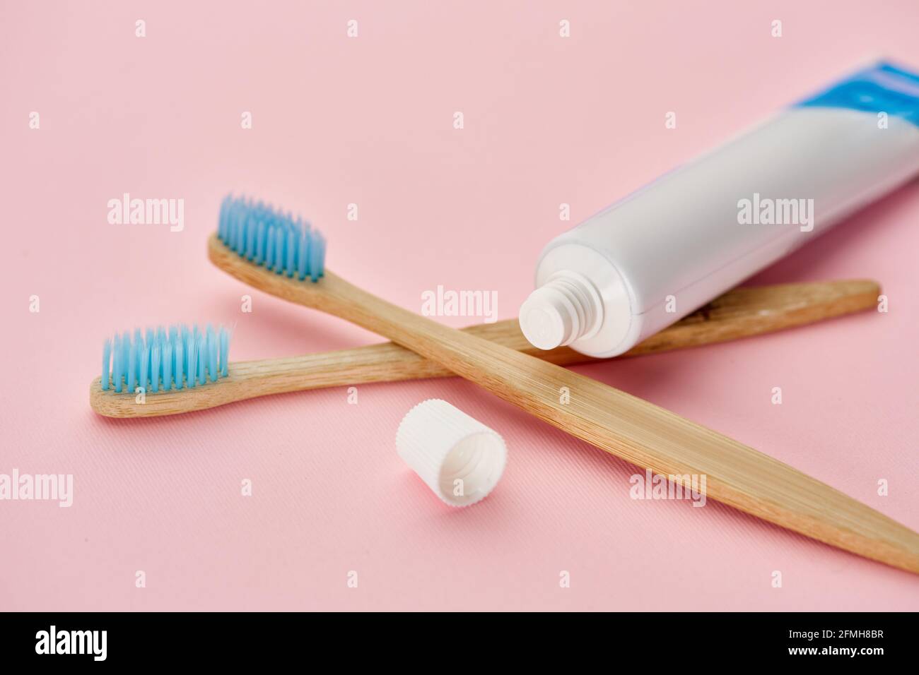 Oral care products, two toothbrush and toothpaste Stock Photo - Alamy
