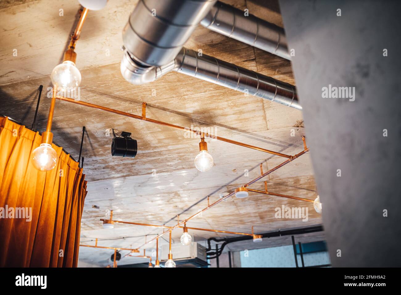 A shot of a modern led lightning hanging from ceilings Stock Photo - Alamy