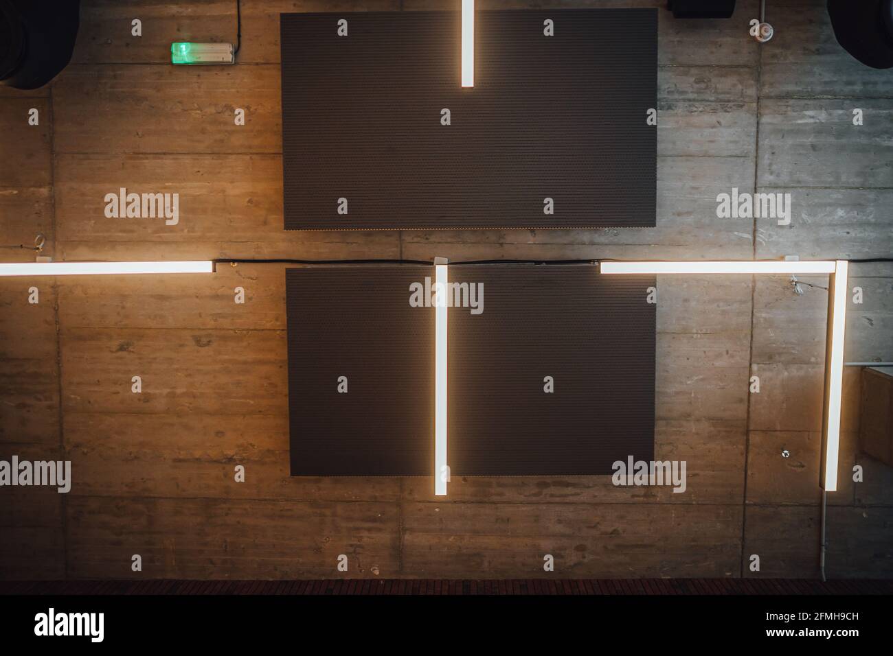 A shot of modern led lightning hanging from ceilings, industrial ...