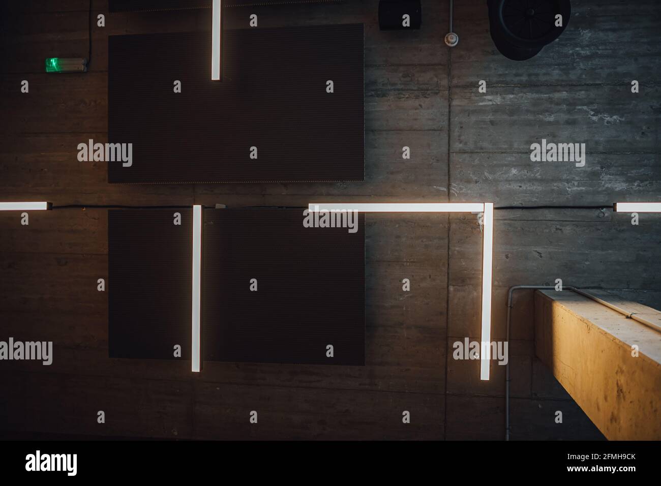 A shot of modern led lightning hanging from ceilings, industrial ...