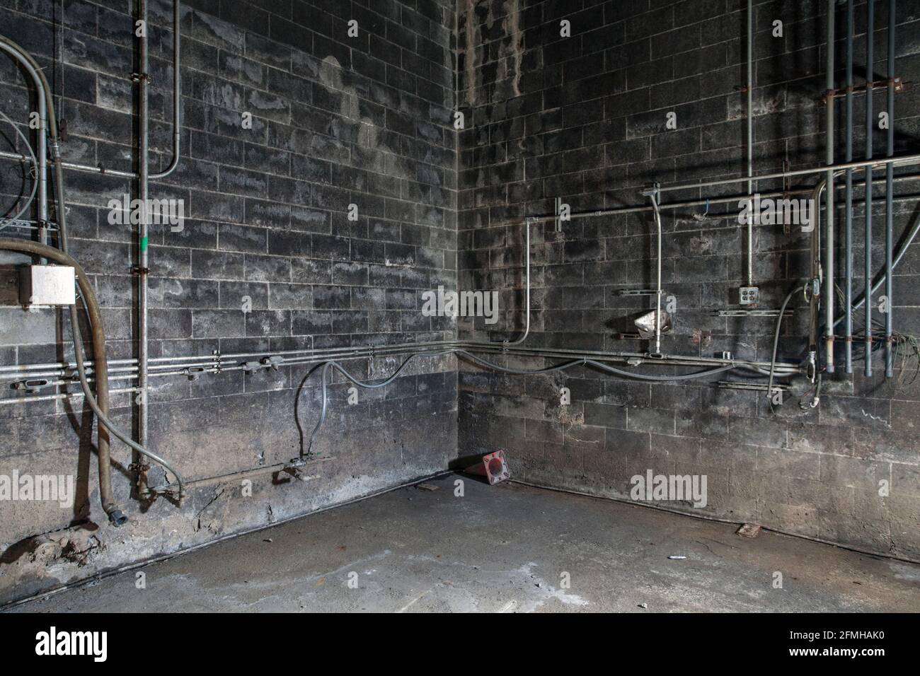 Interior of an abandoned decaying industrial building Stock Photo - Alamy