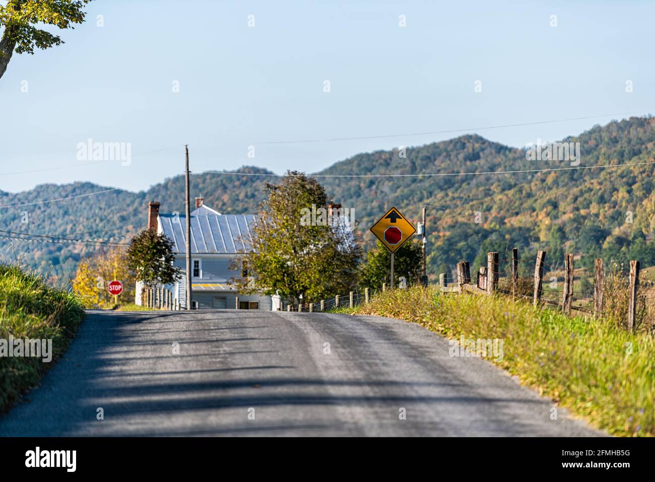 Rural countryside small road with roadside farmhouse house home ...