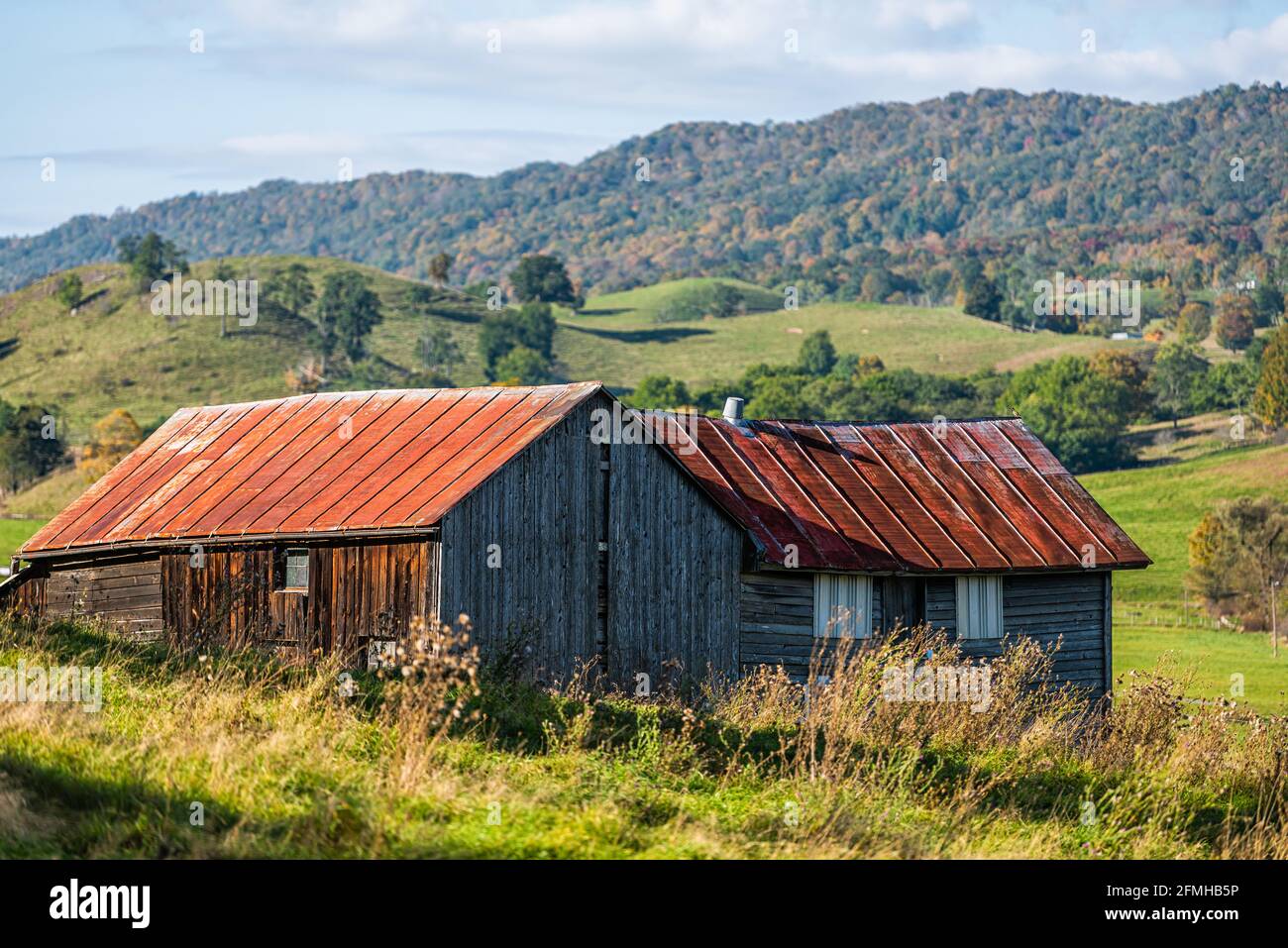 Rural countryside small roadside farmhouse house home building on farm ...