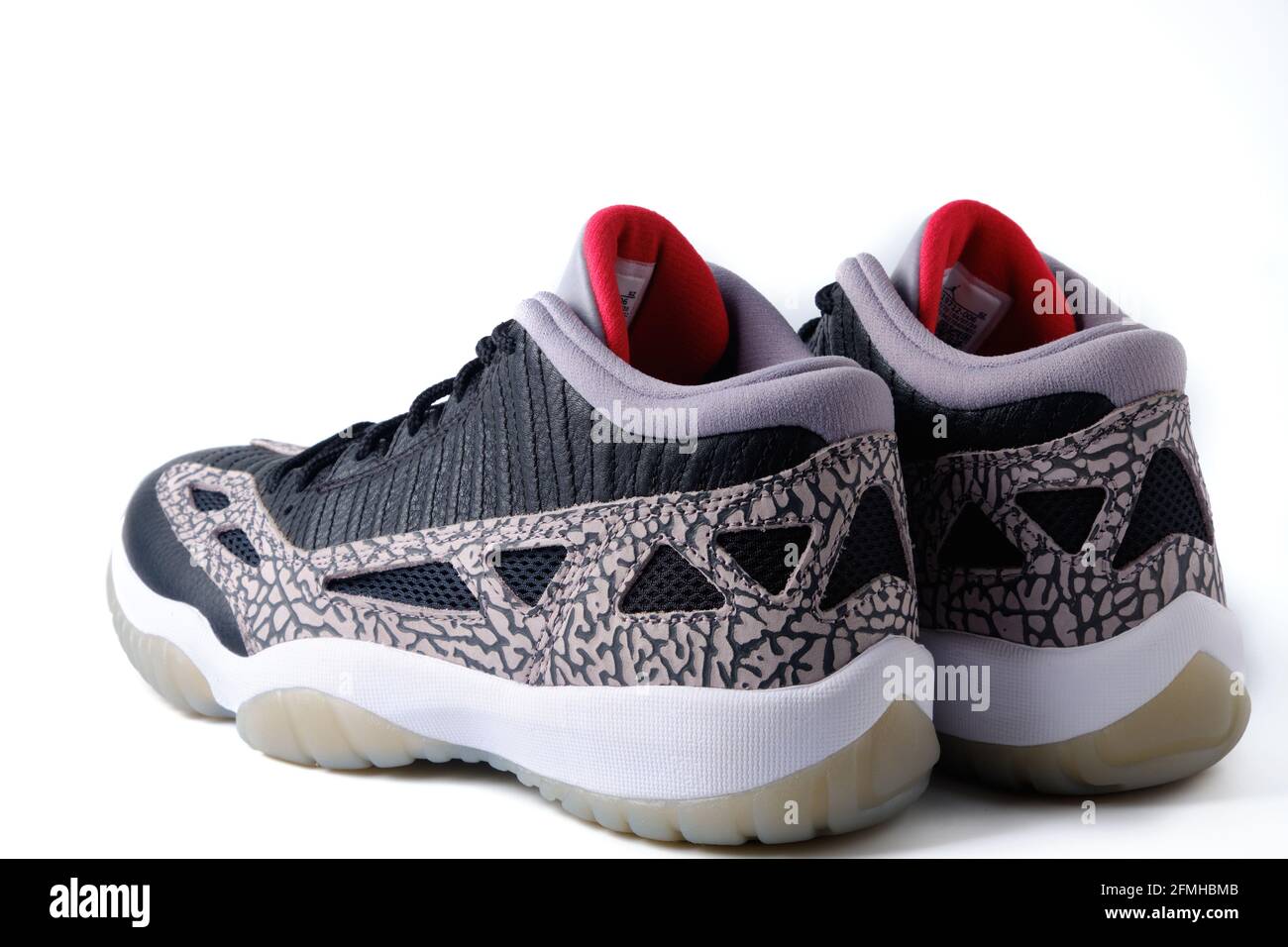Nike Air Jordan 11 Referee low black cement colorway sneakers isolated ...