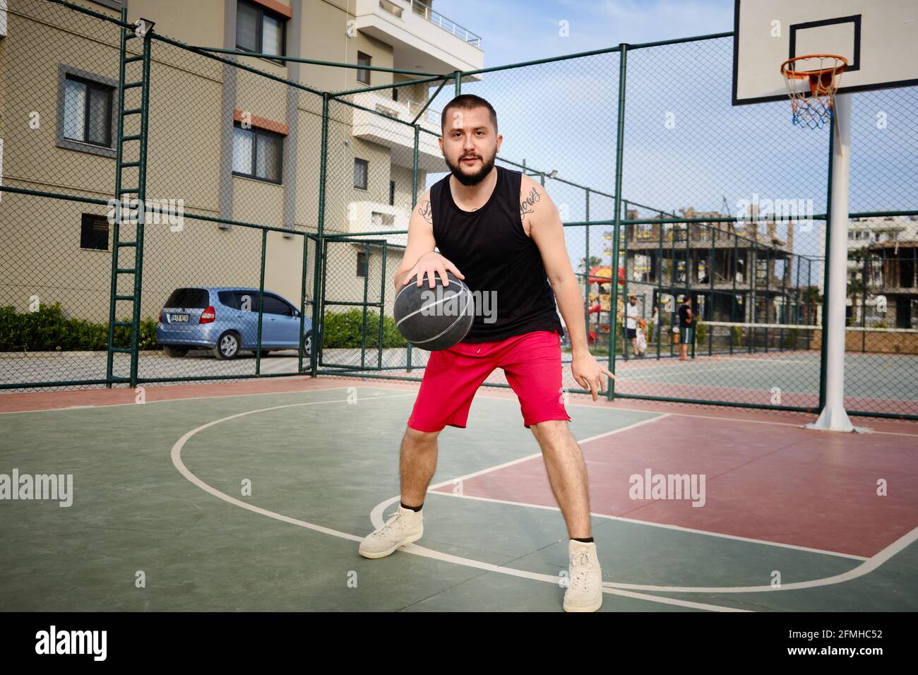 Young basketball player dribbling ball hi-res stock photography and ...