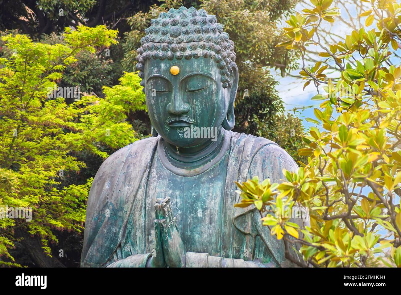 tokyo, japan - may 05 2021: Close up on the bronze statue of Buddha ...