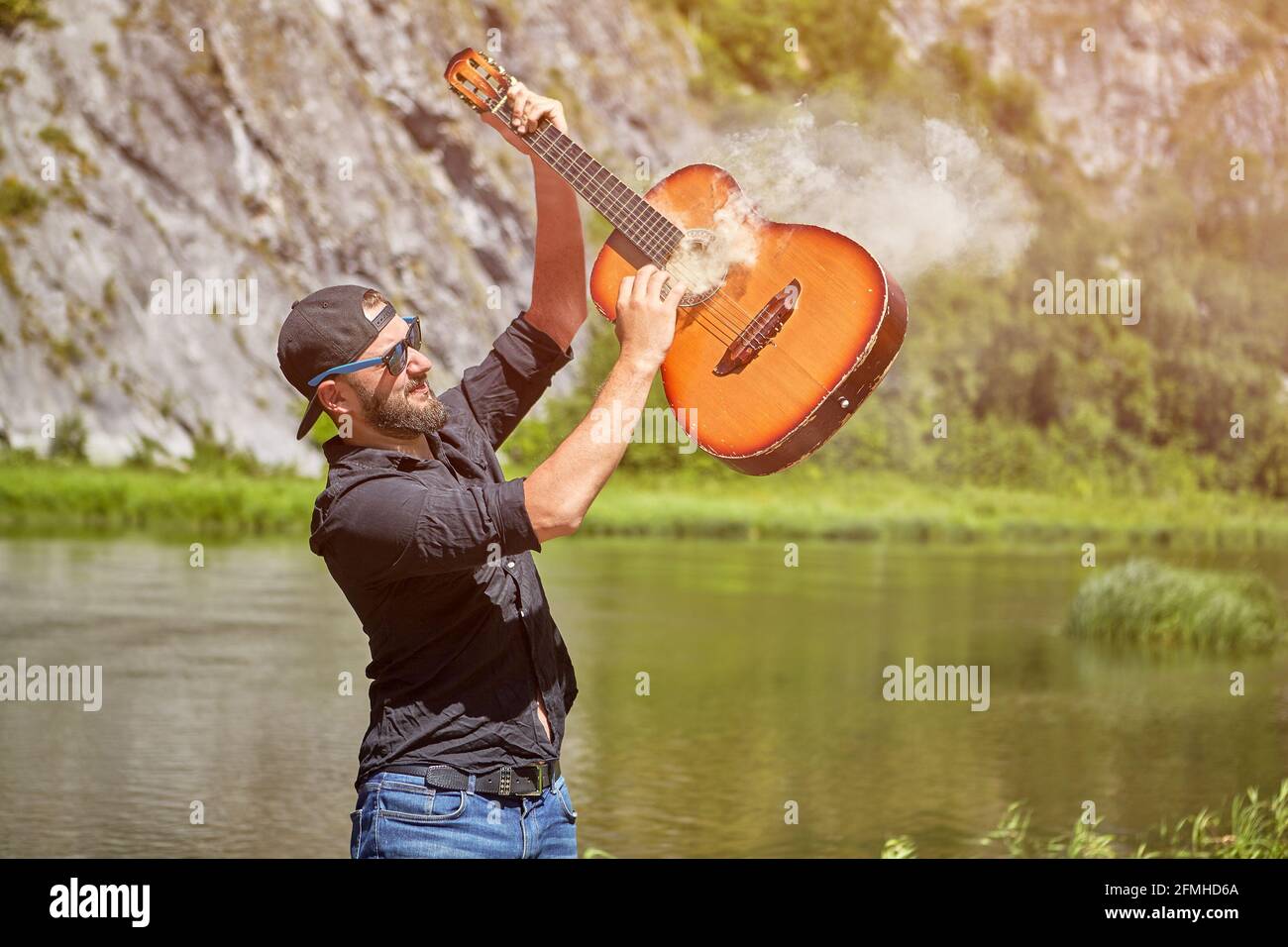 Smoking guitar hi-res stock photography and images - Alamy