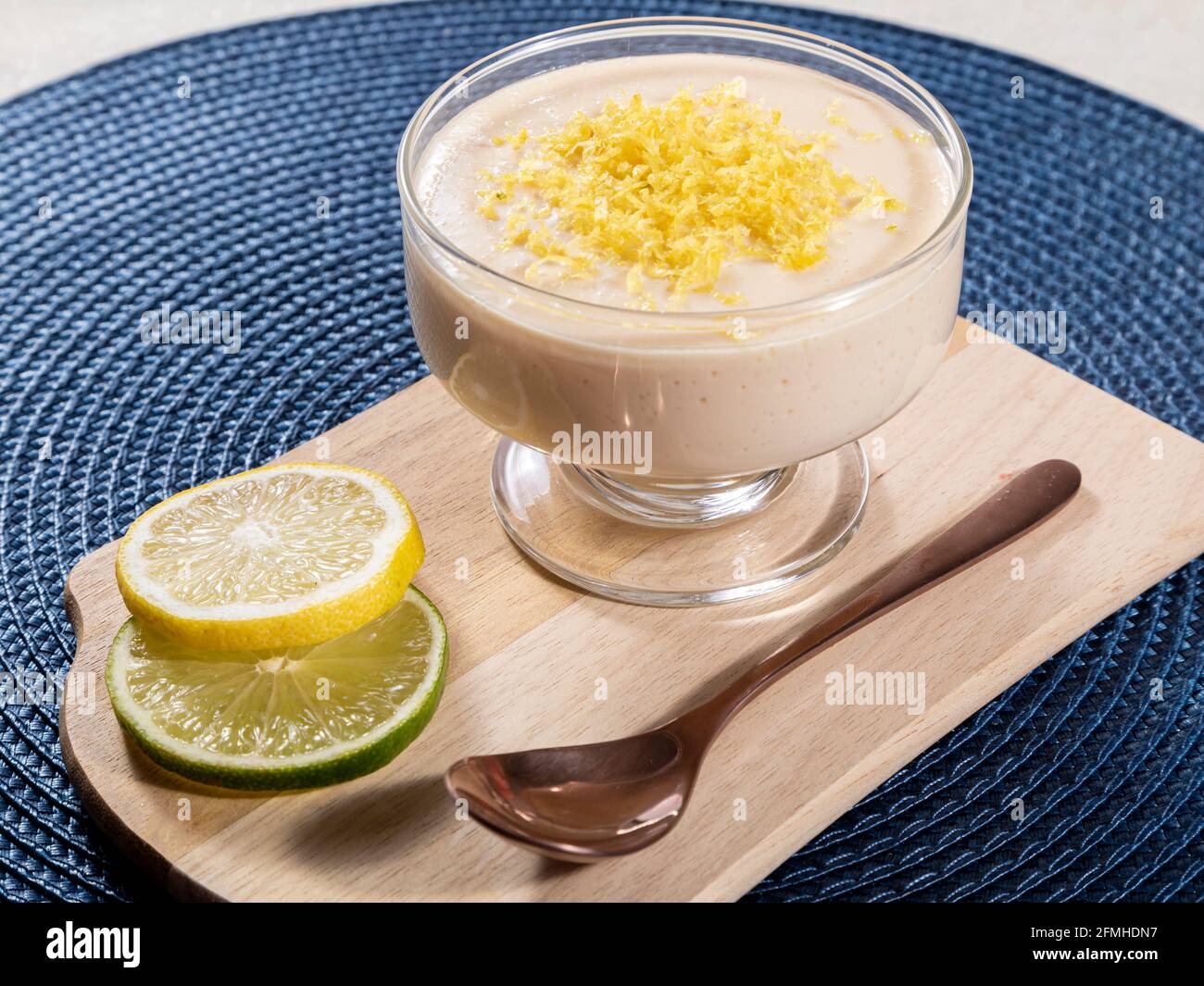 Lemon mousse in crystal bowl with lemon zest Stock Photo - Alamy
