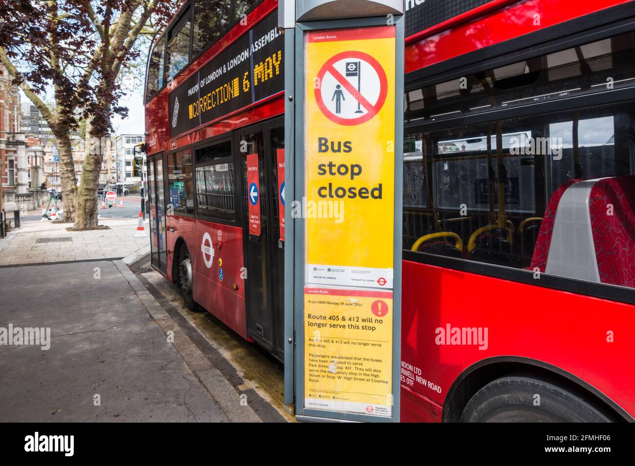 Bus Stop temporarily not in use with a BUS stopped next to post Stock ...