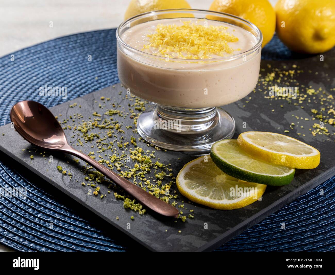 Lemon mousse in crystal bowl with lemon zest Stock Photo - Alamy