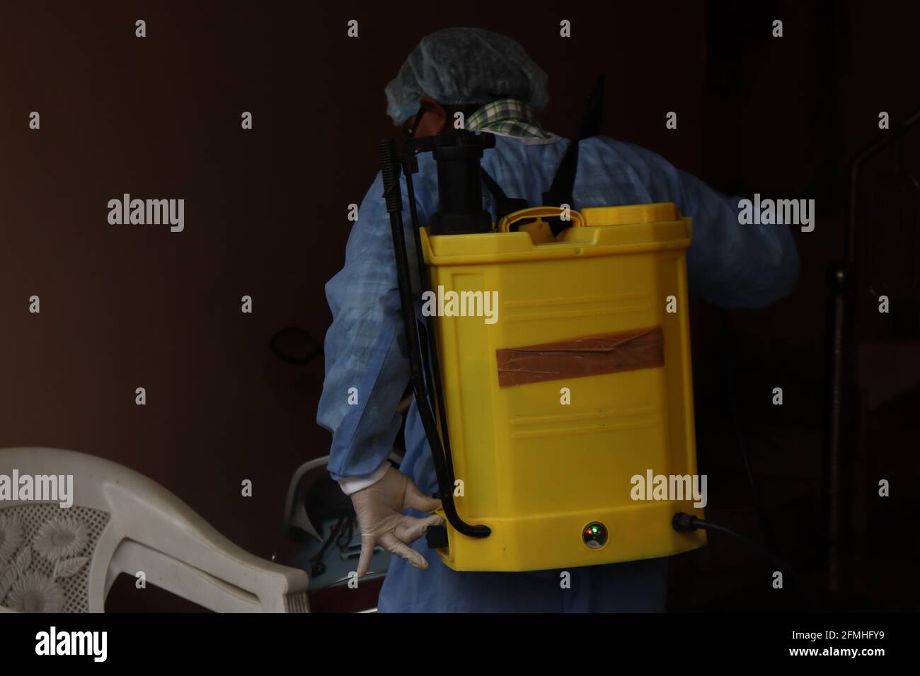 Ppe suit sanitizing hi-res stock photography and images - Alamy
