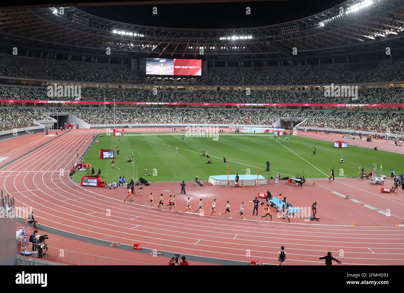Tokyo, Japan. 9th May, 2021. Athletes run, jump and throw at a track ...