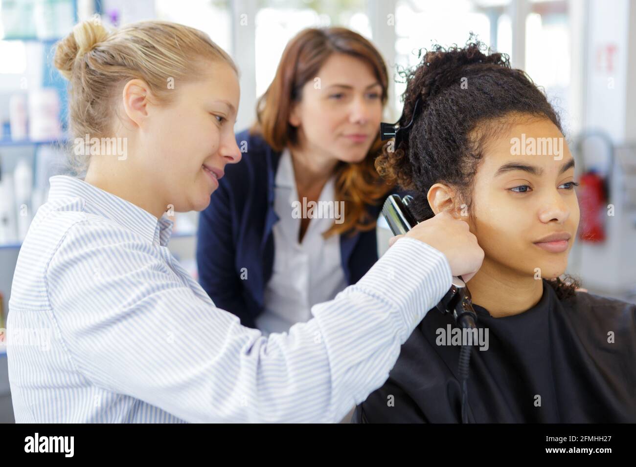 women hairdressers standing in hair and beauty salon Stock Photo - Alamy