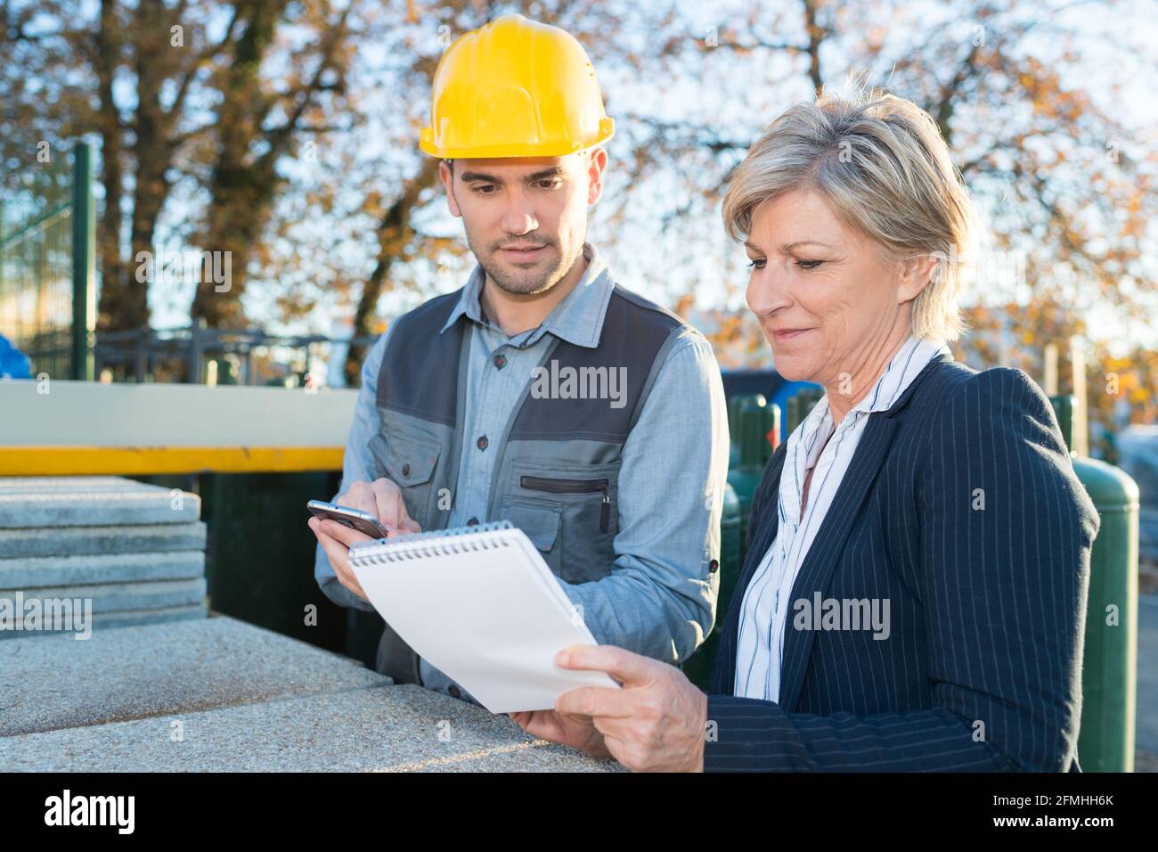 construction material supplier clerk checking the delivery Stock Photo ...