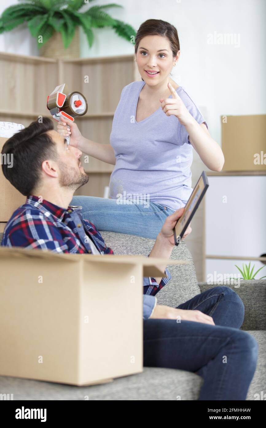happy adult couple moving out or in to new home Stock Photo - Alamy