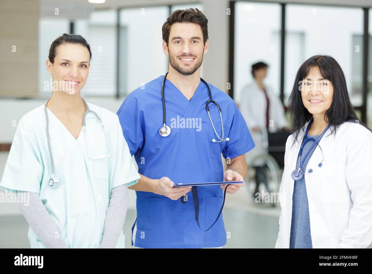 team of doctors at the corridor Stock Photo - Alamy