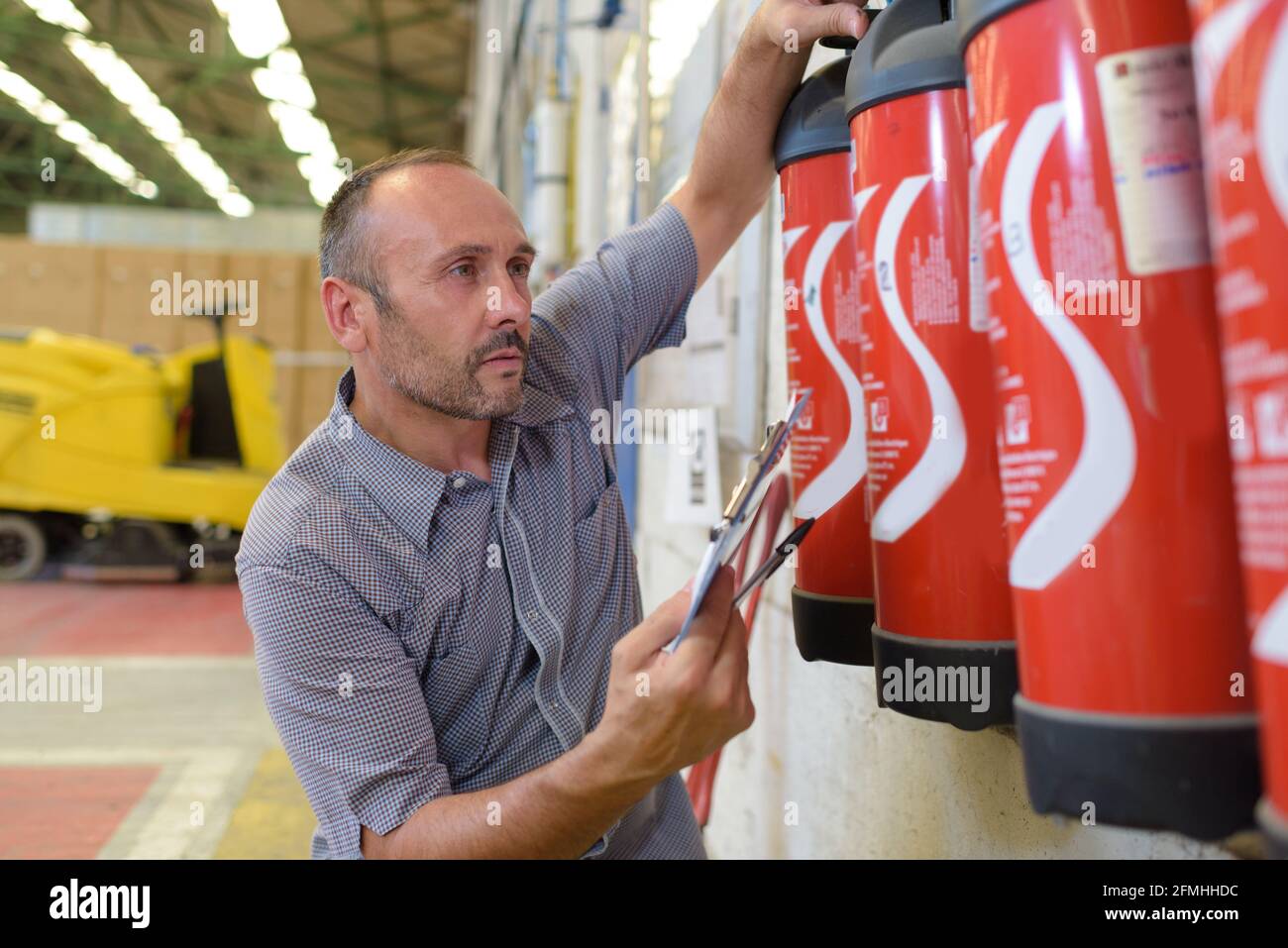 fire extinguishers in factory Stock Photo - Alamy