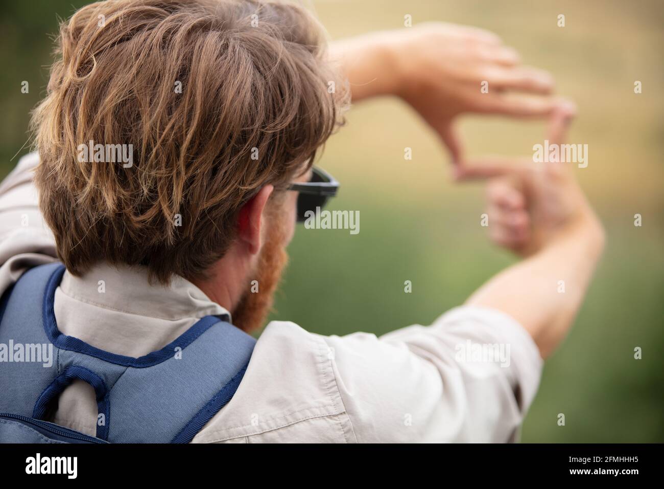 landscape photography concept - young man framing the landscape Stock ...
