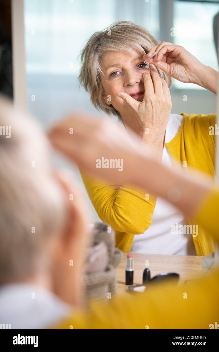 Tweezer woman face hi-res stock photography and images - Alamy