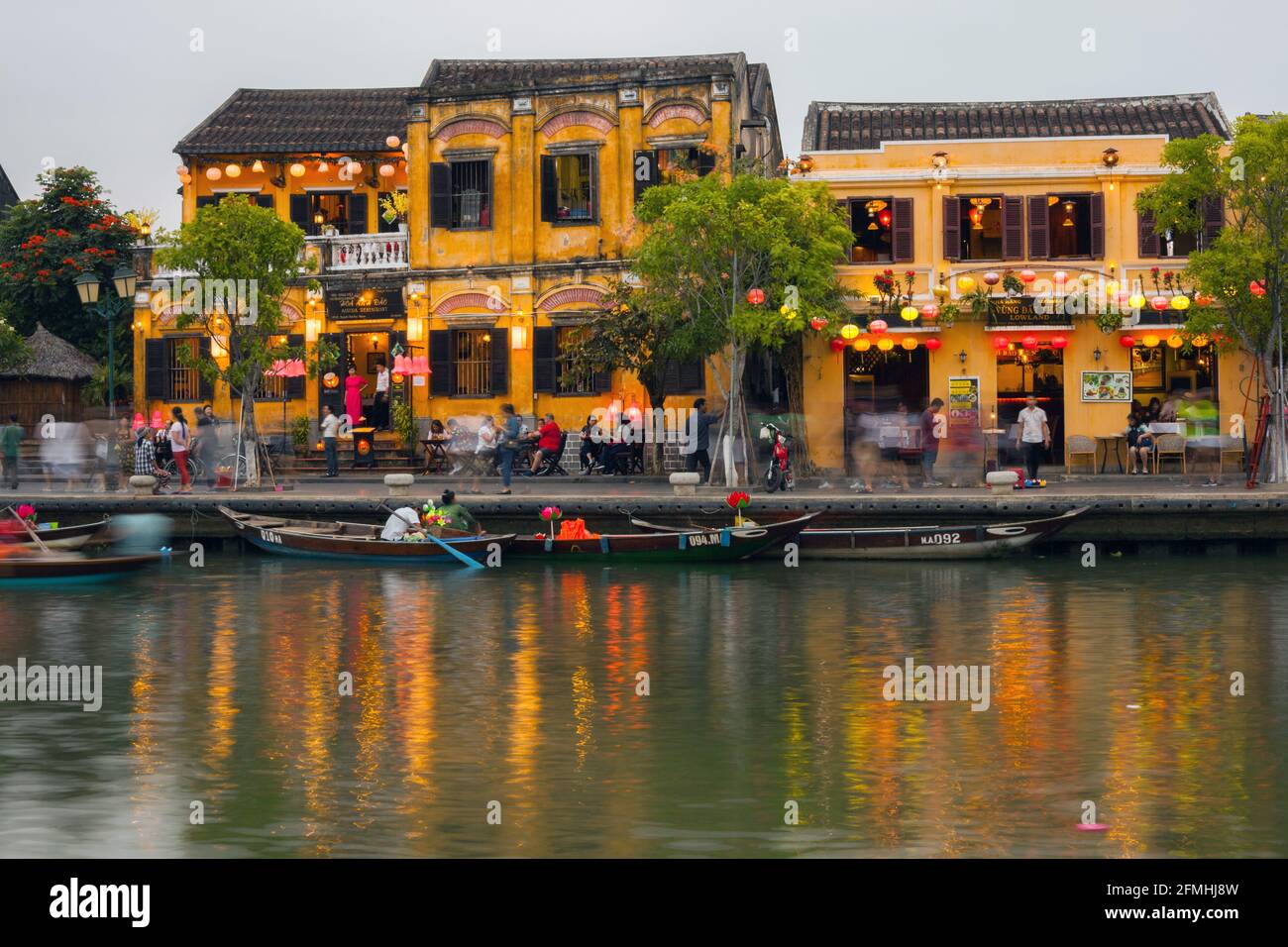 Colourful lights reflected on water by the riverside in Old Town, Hoi ...