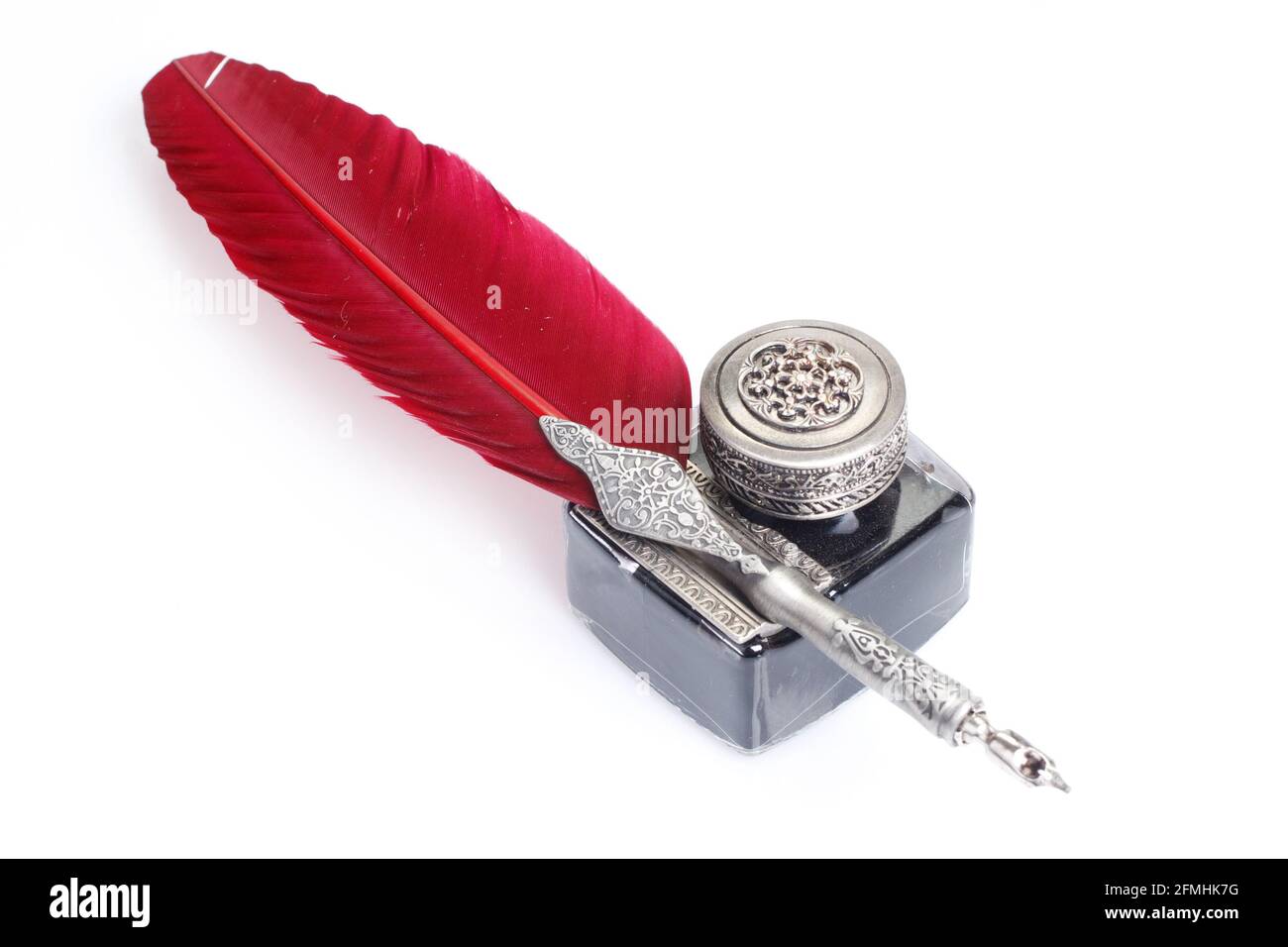 Old vintage red fountain pen with inkwell on white background Stock ...