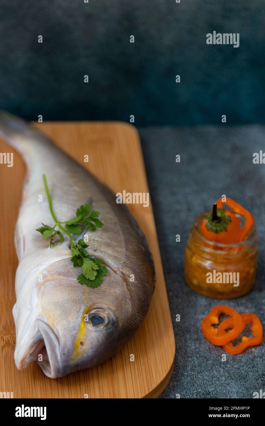 Still life with fresh fish and Peruvian ingredients for cooking Stock ...