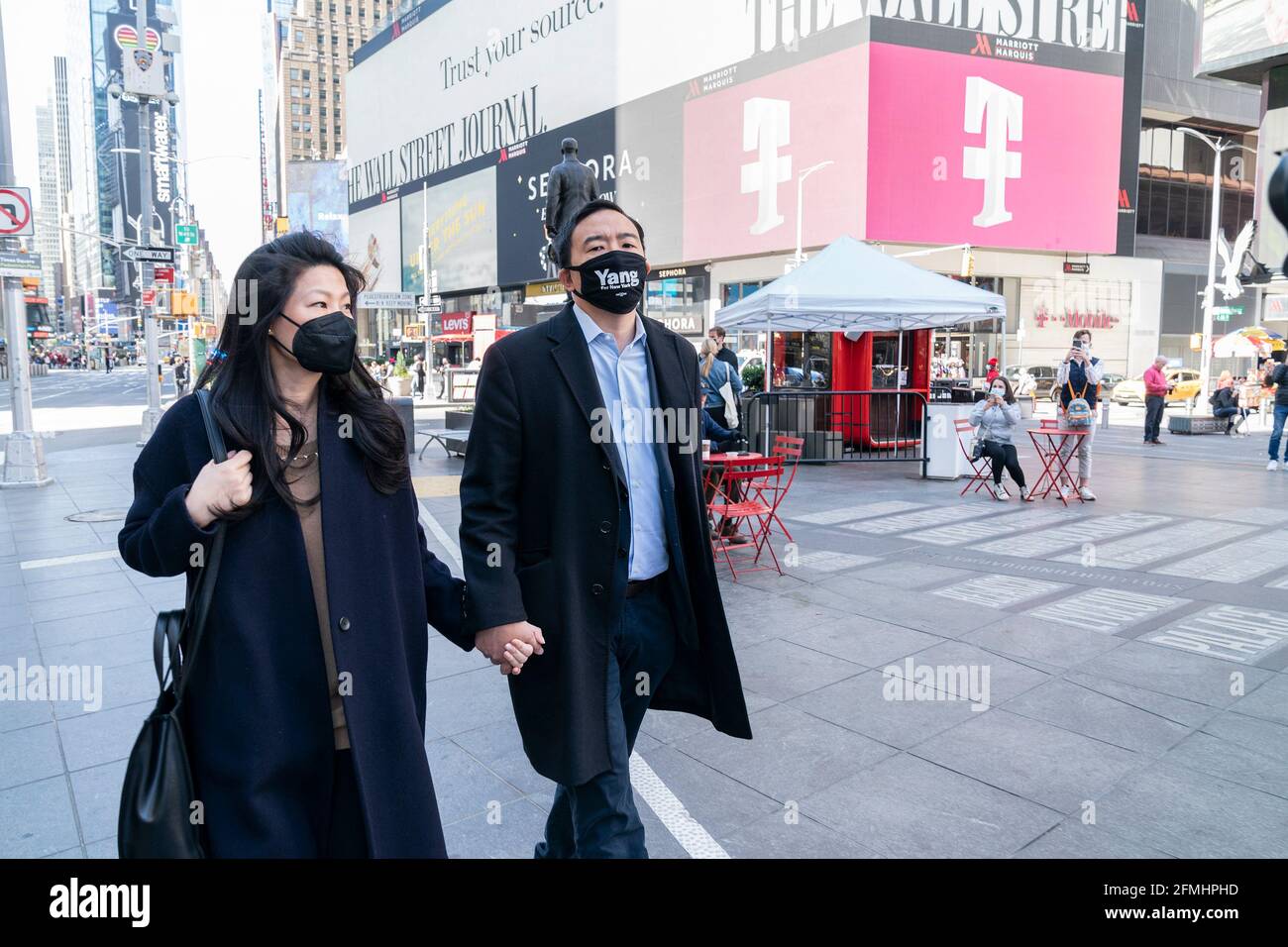 Mayoral candidate Andrew Yang with wife Evelyn Yang arrives for press ...