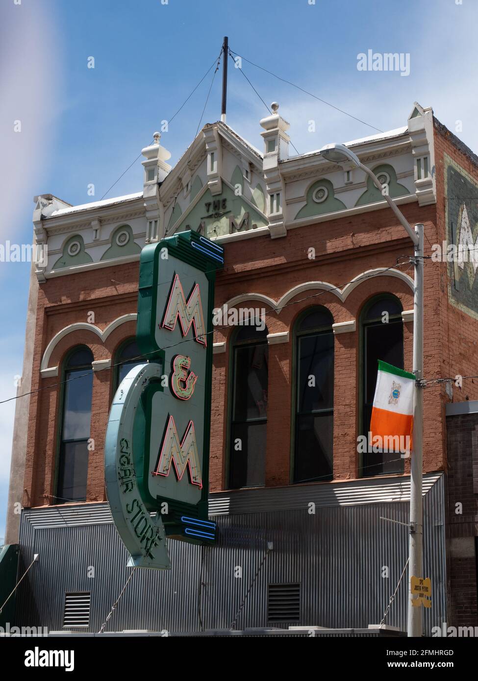 The historic M & M Bar and Cigar Store vintage neon sign on a historic ...