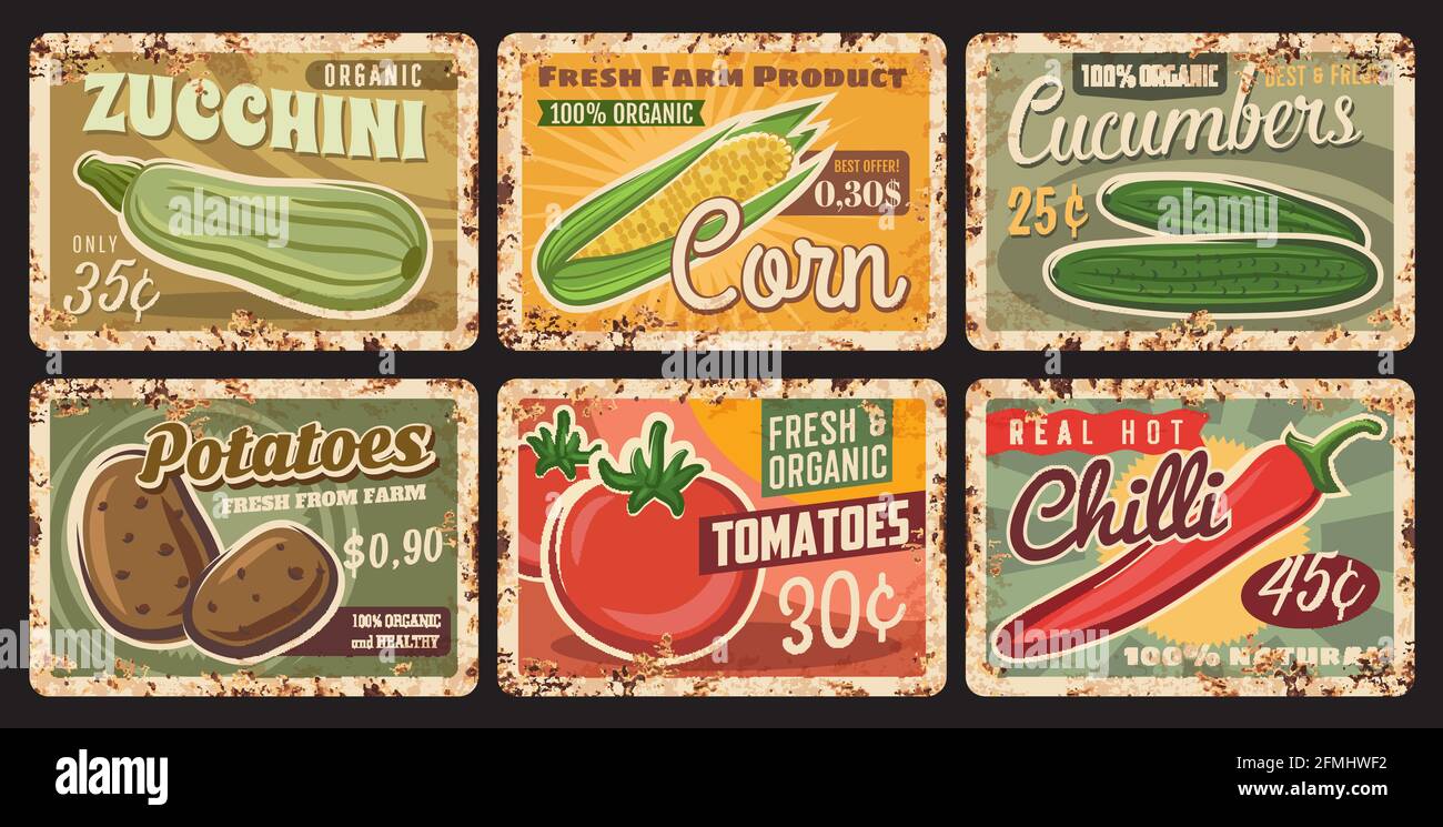 Farm vegetables harvest rusty metal plate. Zucchini, corn and cucumbers ...