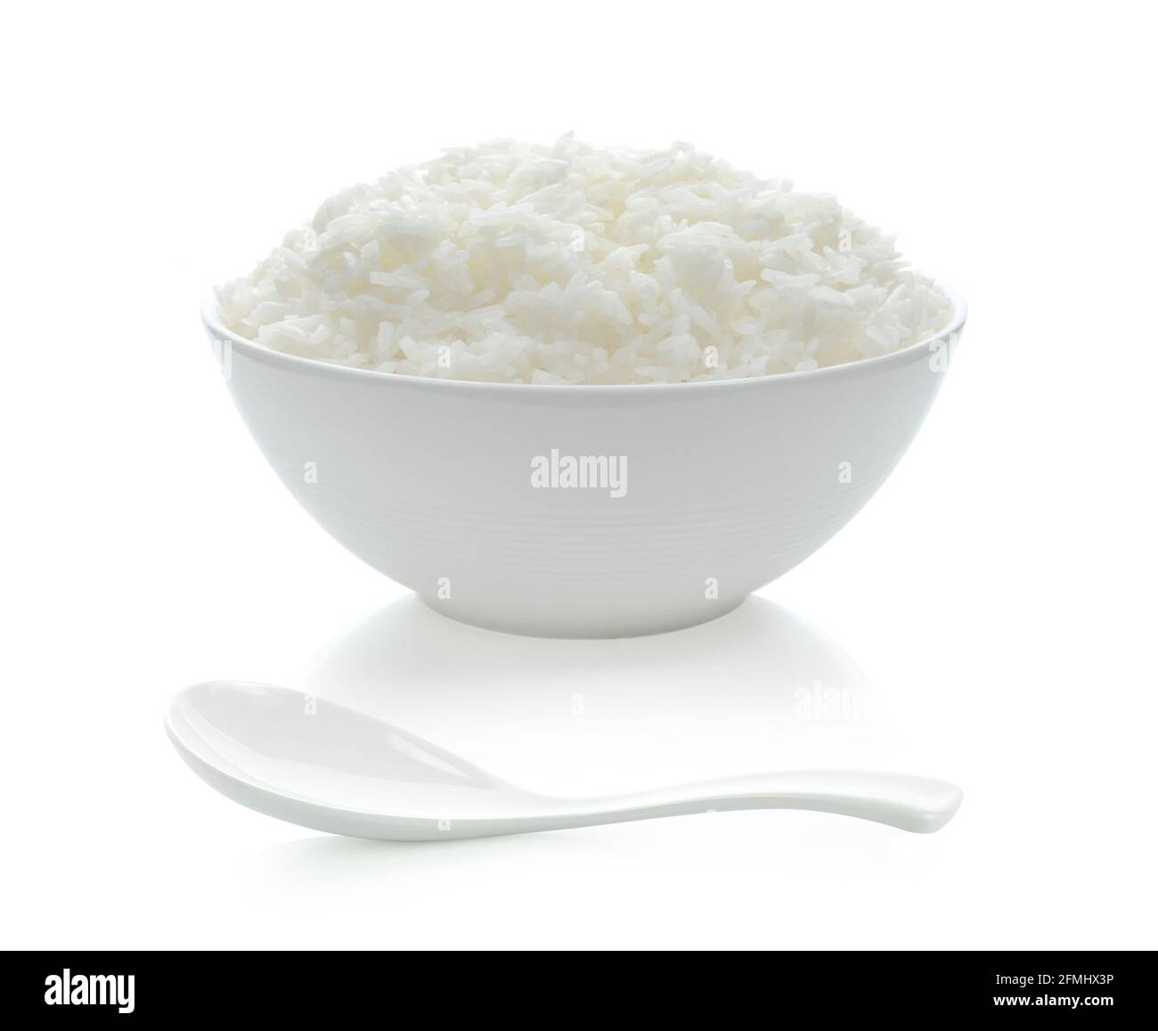 rice in bowl isolated on white background Stock Photo - Alamy