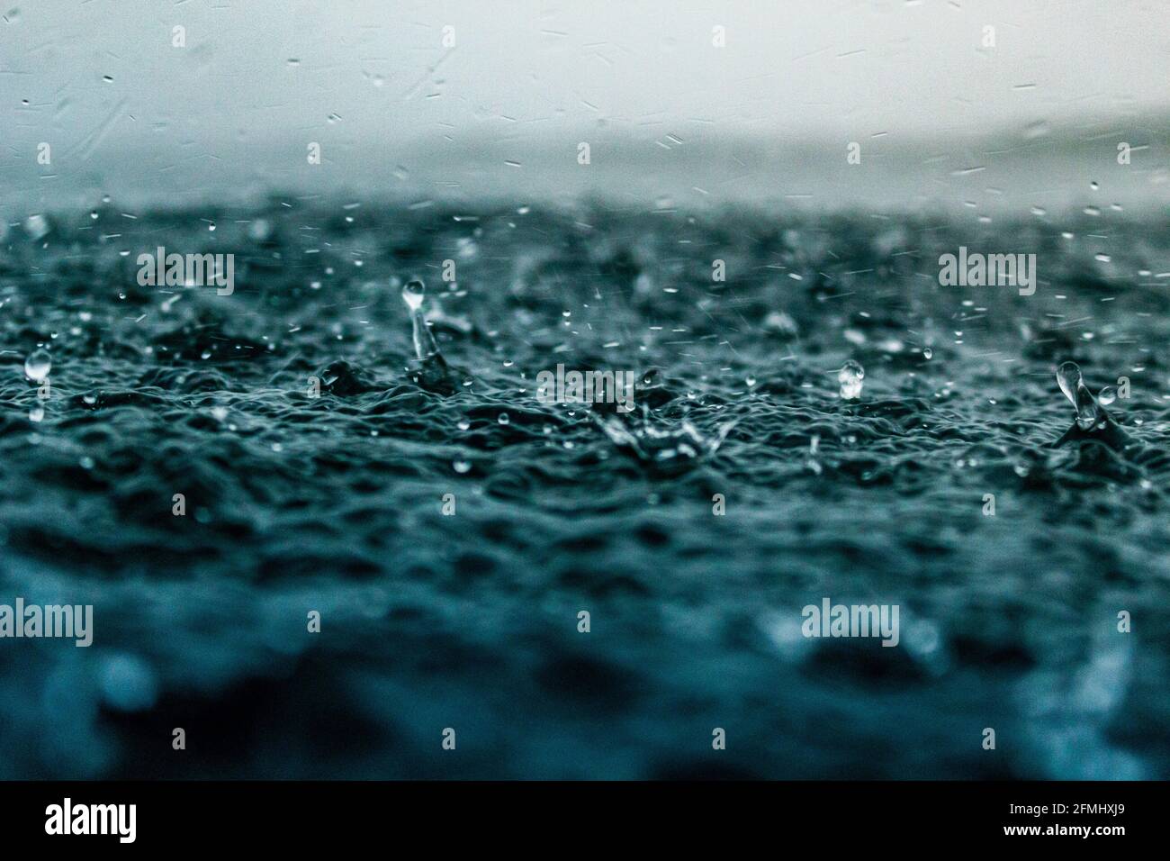 Droplets Hitting The Water Surface Ocean Sea Rain Drops Stock Photo - Alamy