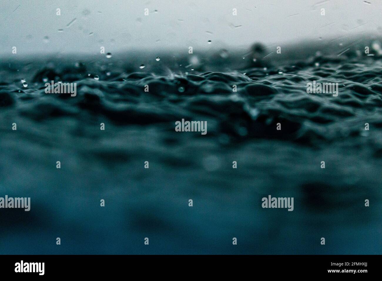 Droplets Hitting The Water Surface Ocean Sea Rain Drops Stock Photo - Alamy