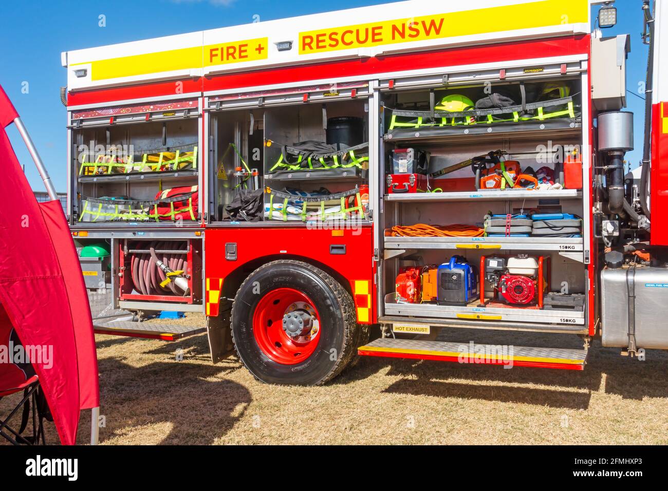 Fire fighting equipment in compartments of a fire truck Stock Photo - Alamy