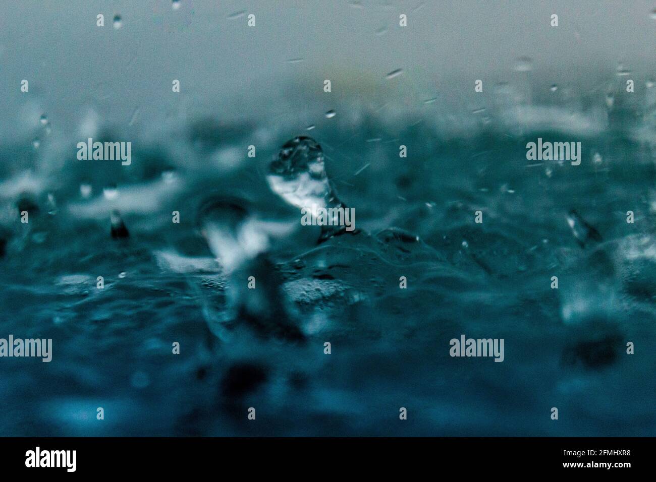 Rain on ocean surface hi-res stock photography and images - Alamy