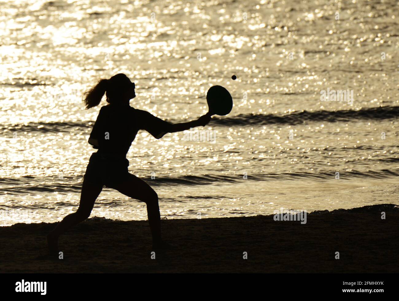 Playing Matkot ( paddle ball ) on the beach in Tel-Aviv Stock Photo - Alamy