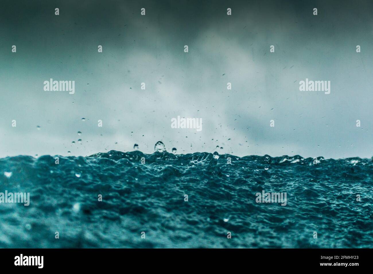 Droplets Hitting The Water Surface Ocean Sea Rain Drops Stock Photo - Alamy