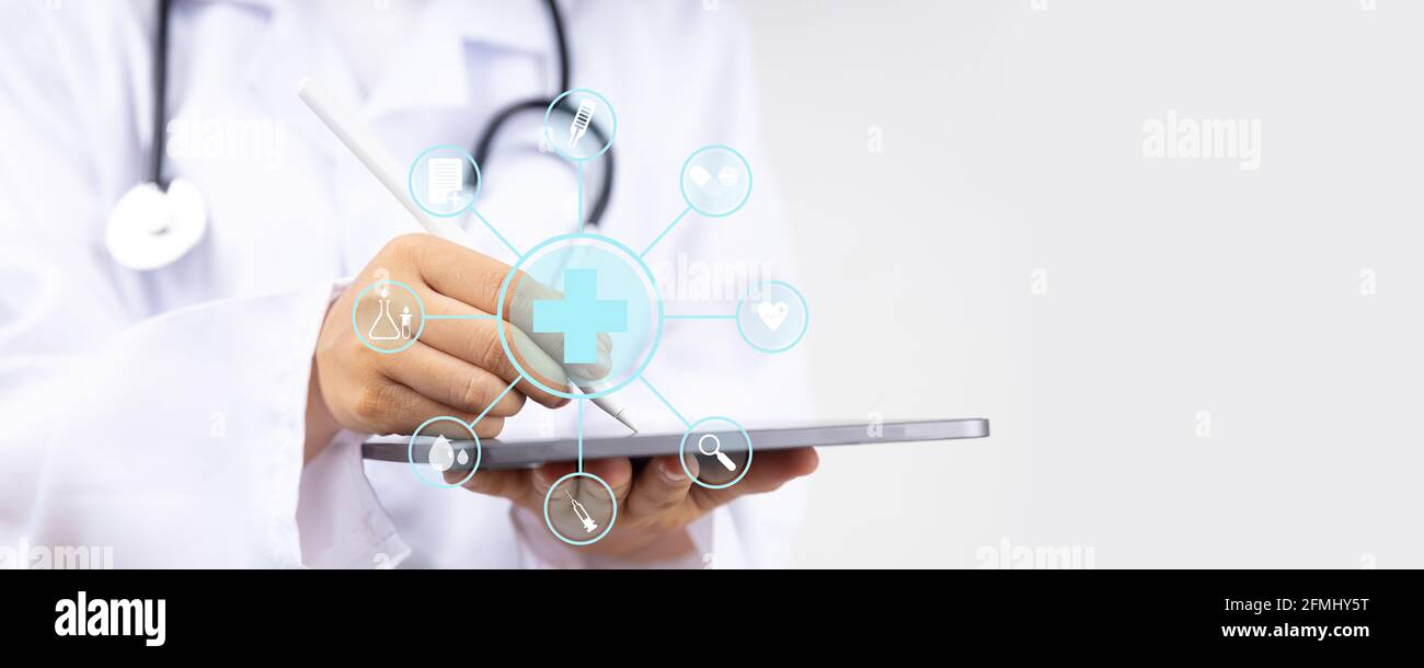 Close up hand of doctor use tablet with health icon to digital ...