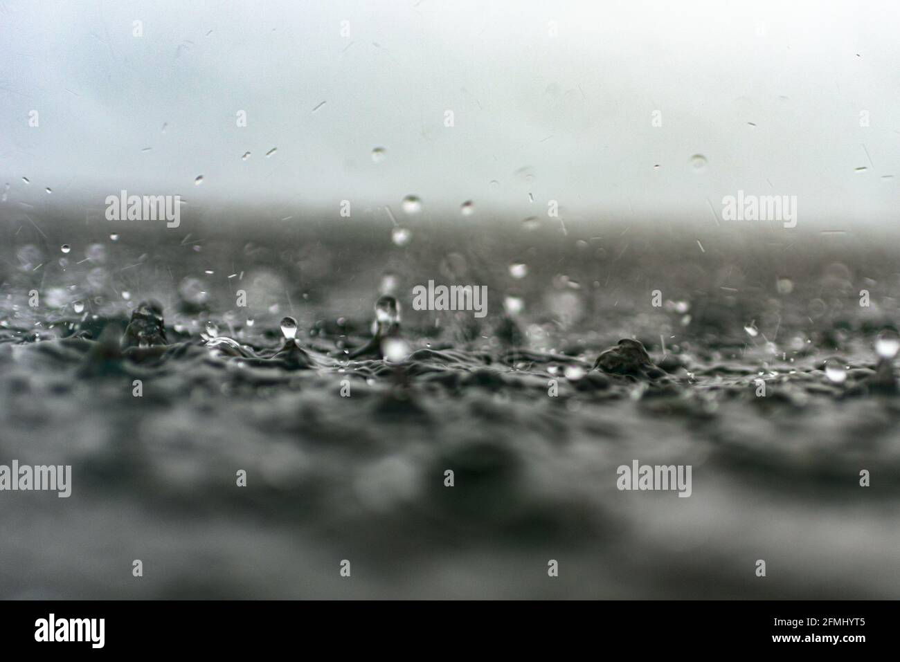 Droplets Hitting The Water Surface Ocean Sea Rain Drops Stock Photo - Alamy