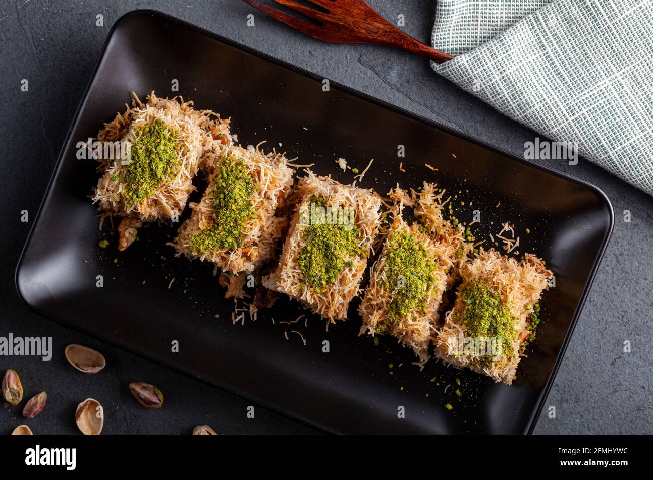 Turkish tel kadayif dessert made from shredded phyllo dough mixed with ...